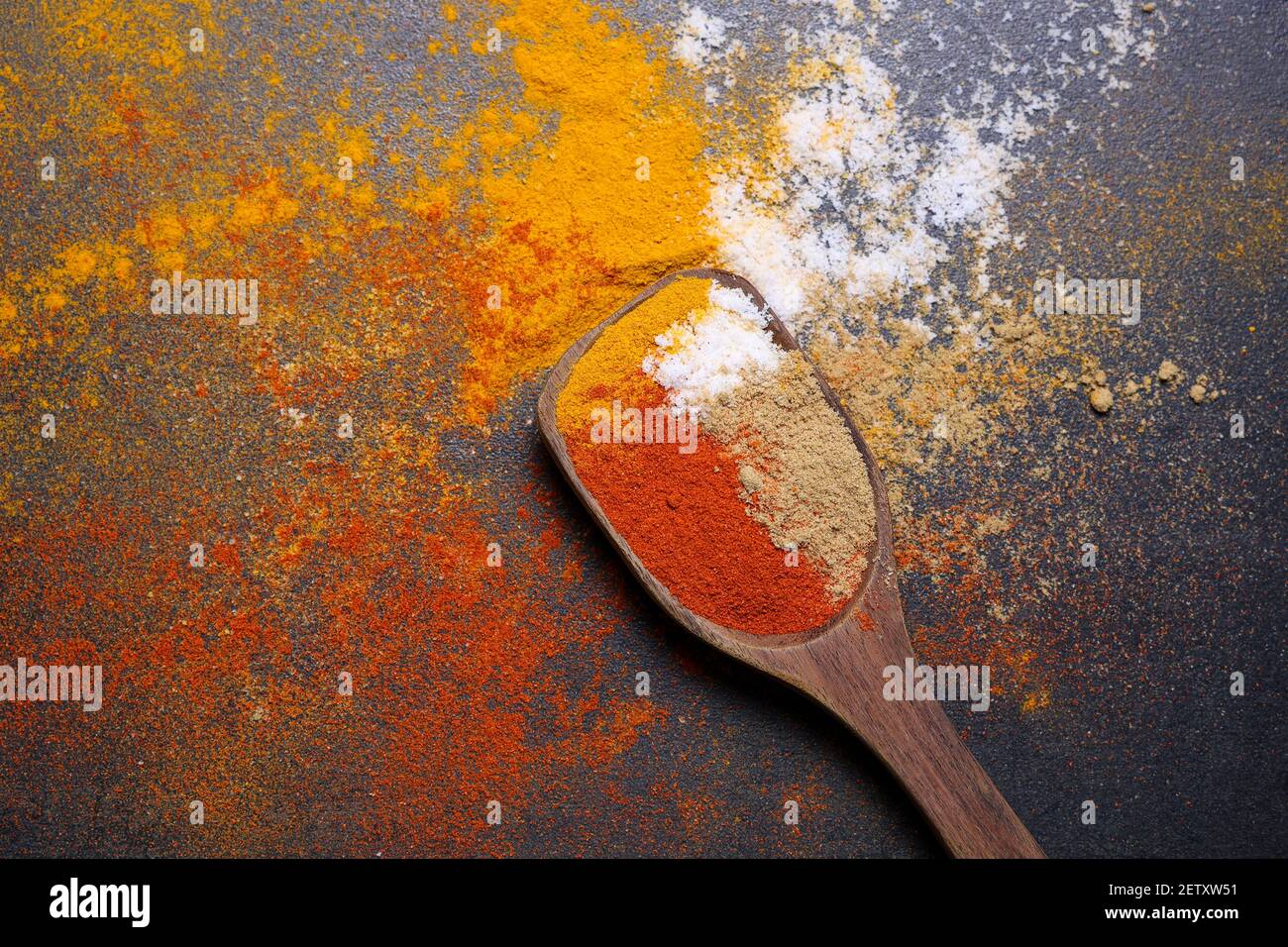 Indian woman hand powdering Indian spices Red chilly , chili paprika ...