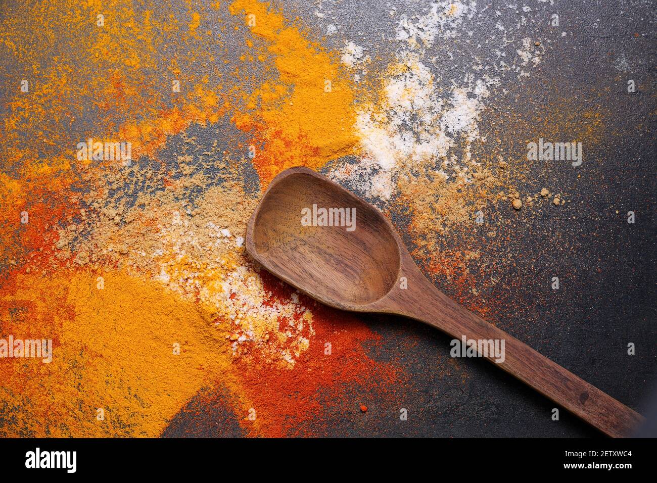 Indian woman hand powdering Indian spices Red chilly , chili paprika ...