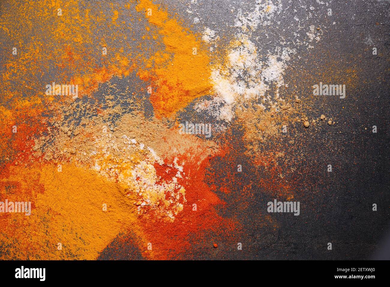 Indian woman hand powdering Indian spices Red chilly , chili paprika ...