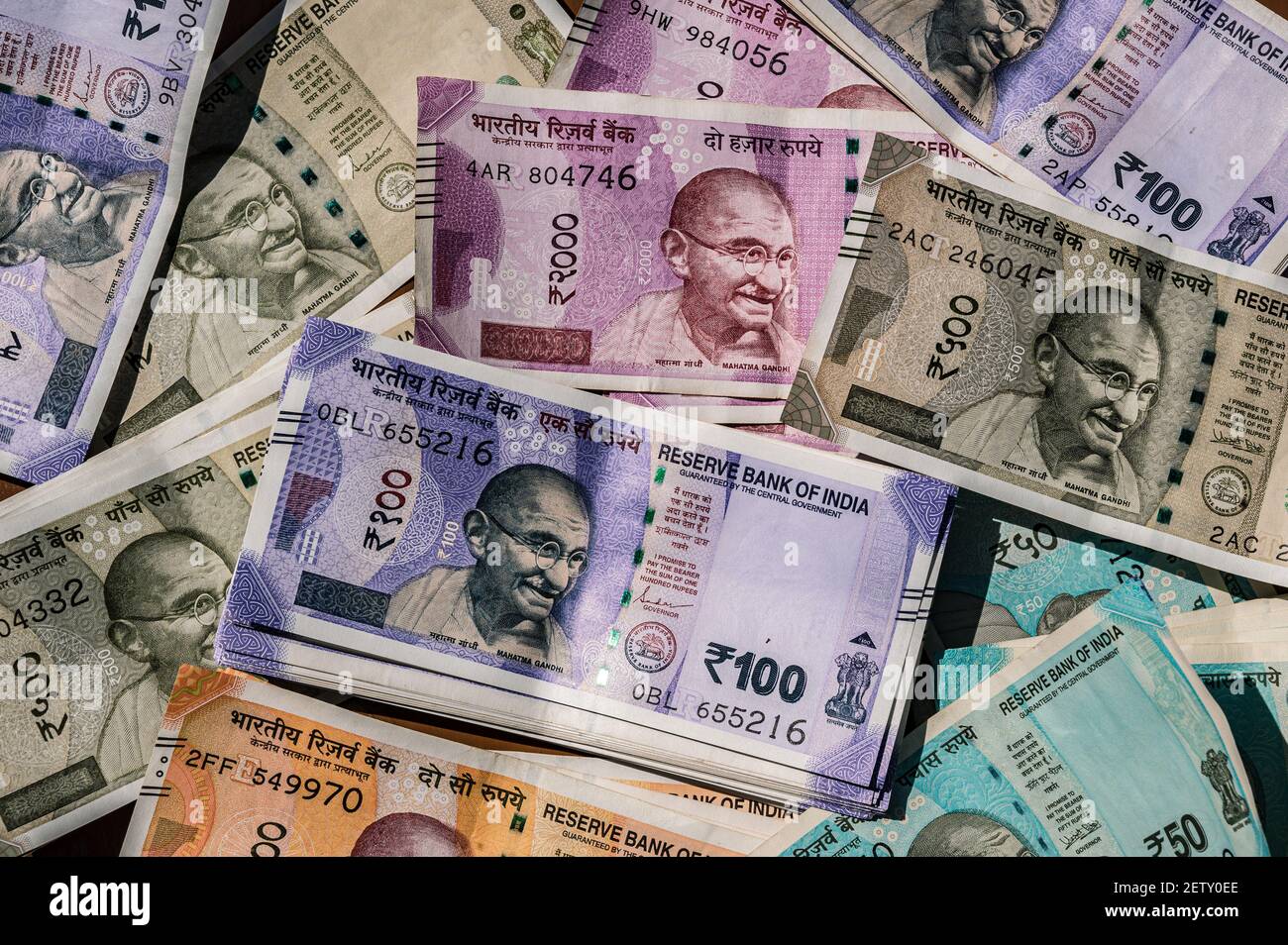 Indian Paper Currency 50, 100, 200, 500, and 2000 rupee on the table in ...