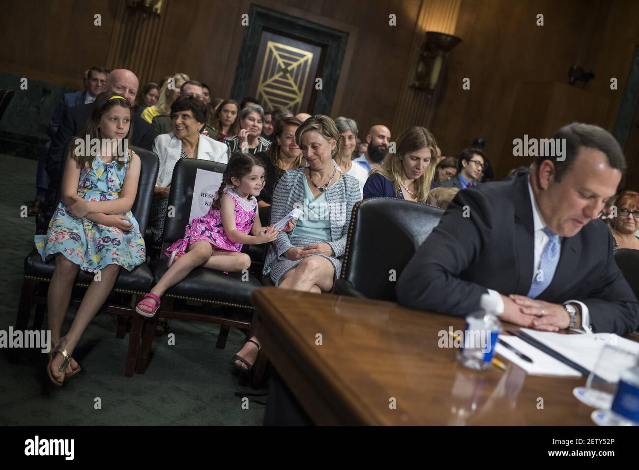 UNITED STATES - JUNE 28: The family of Timothy Kelly, right, nominee to ...