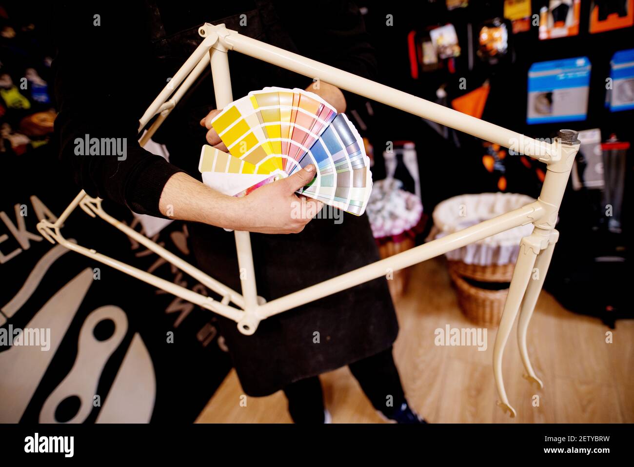 Choosing a color for a bicycle in the workshop from the color palette ...