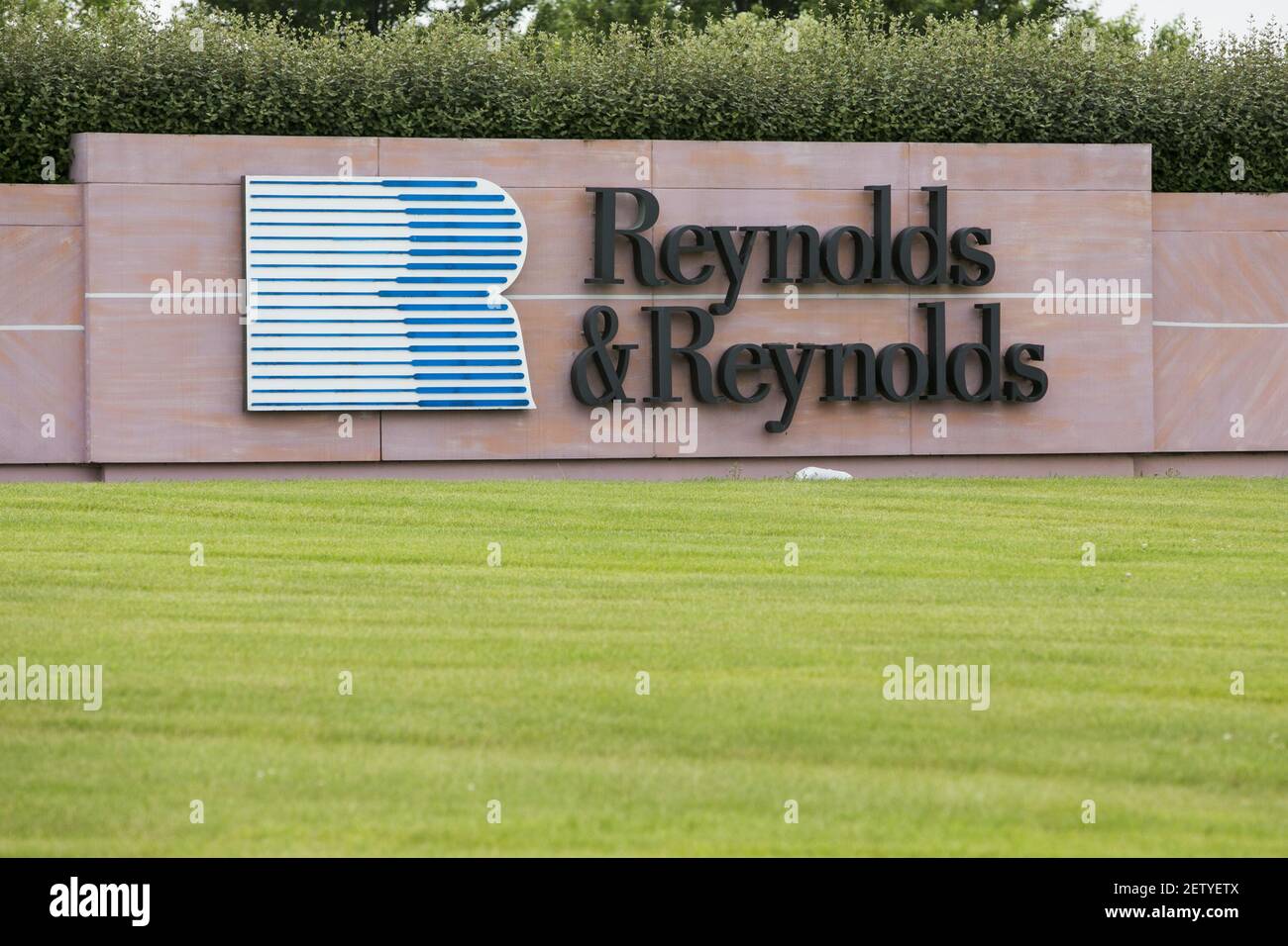 A logo sign outside of the headquarters of The Reynolds and Reynolds ...