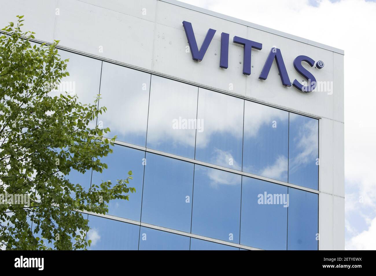 A logo sign outside of a facility occupied by VITAS Healthcare in ...