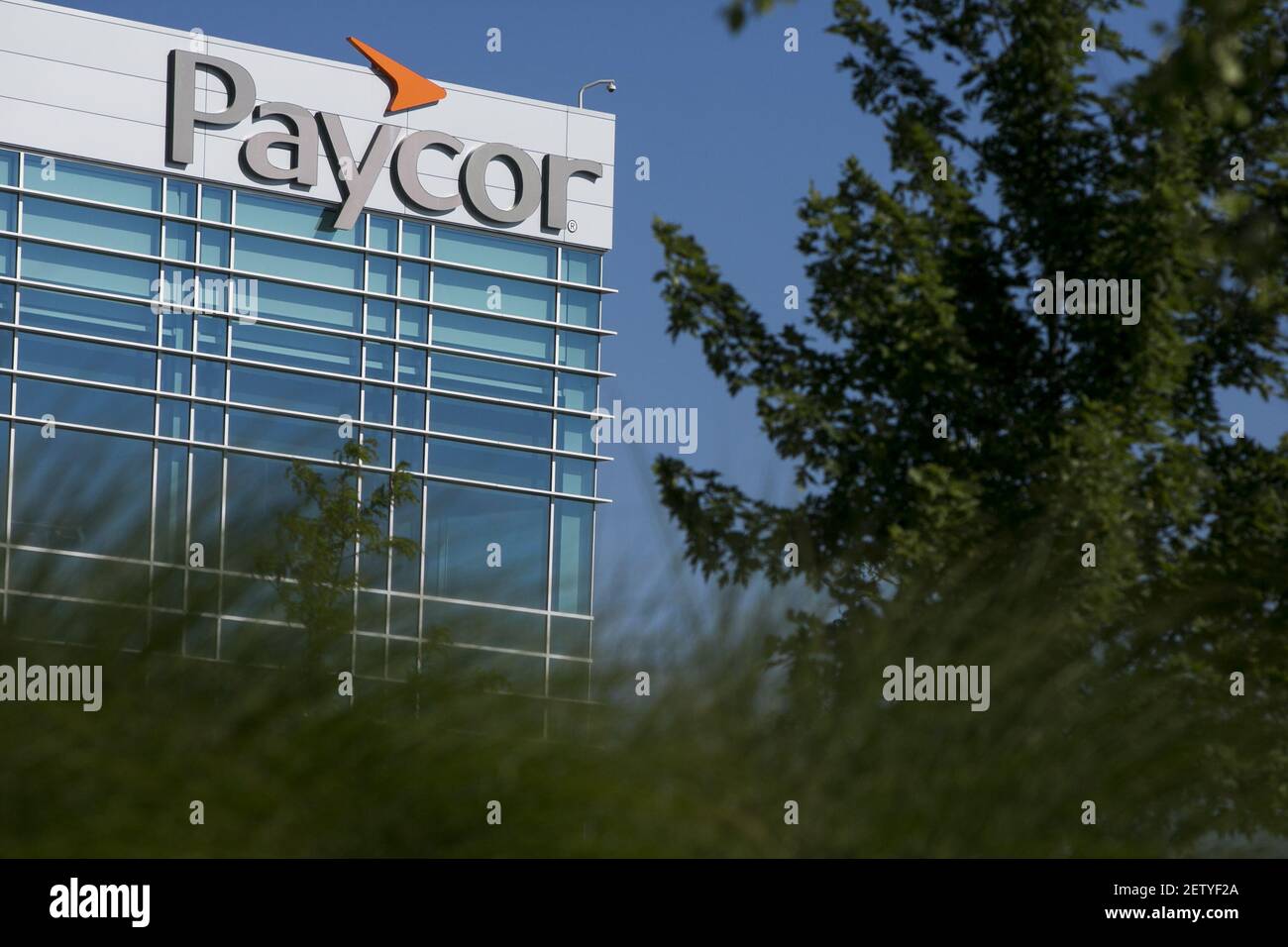 A logo sign outside of the headquarters of Paycor in Cincinnati, Ohio ...