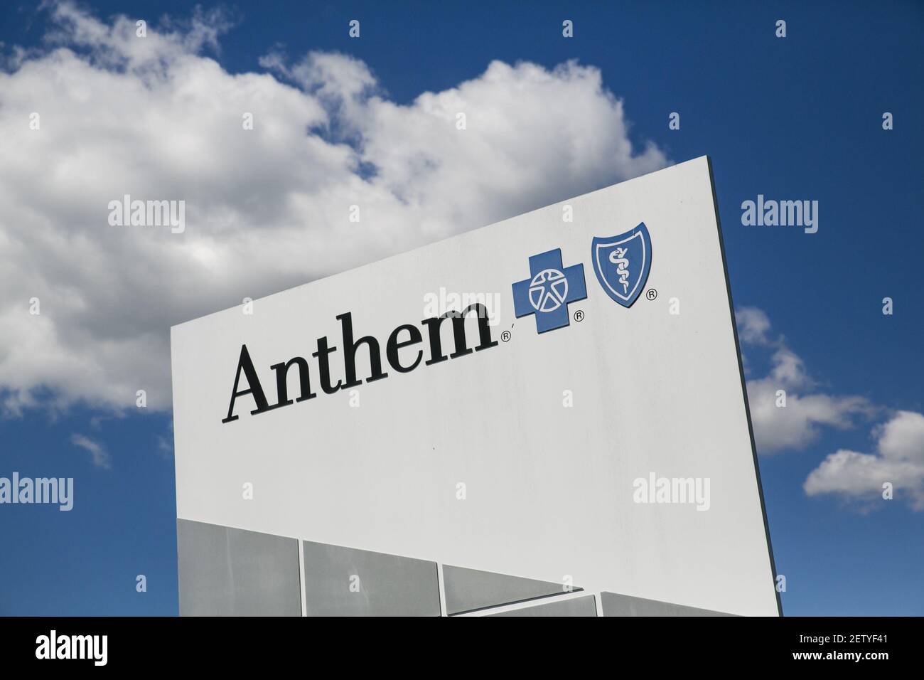 A logo sign outside of a facility occupied by the health insurer Anthem ...