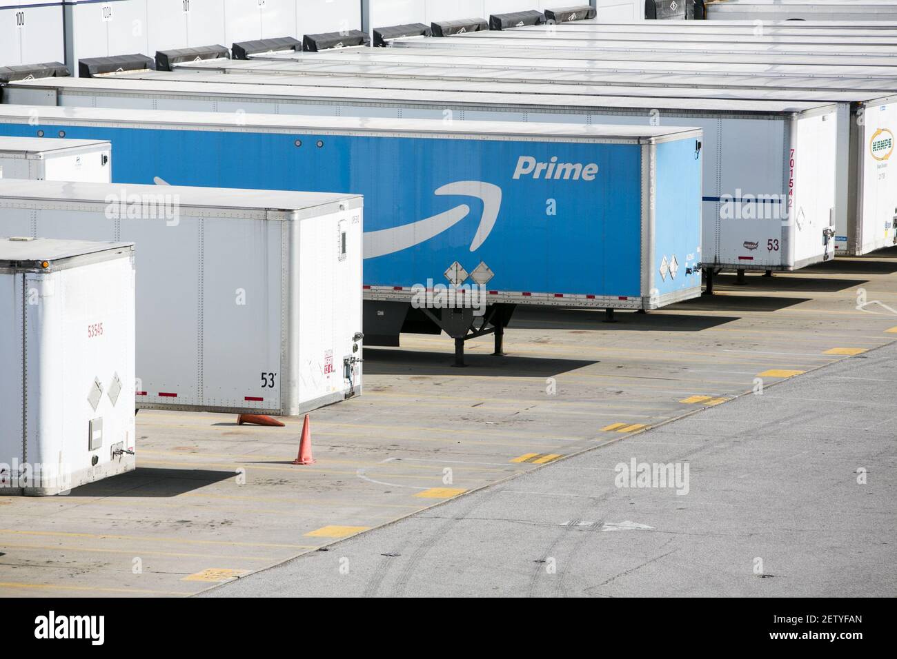 An Amazon Prime logo seen on semi truck trailers outside of a Amazon ...