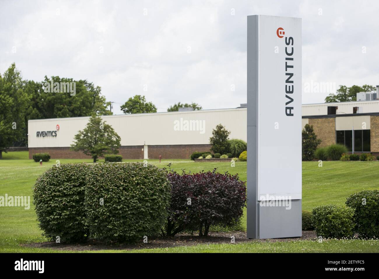 A logo sign outside of a facility occupied by Aventics in Lexington ...