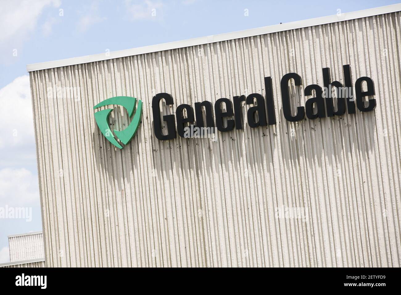 A logo sign outside of the headquarters of General Cable in Highland ...