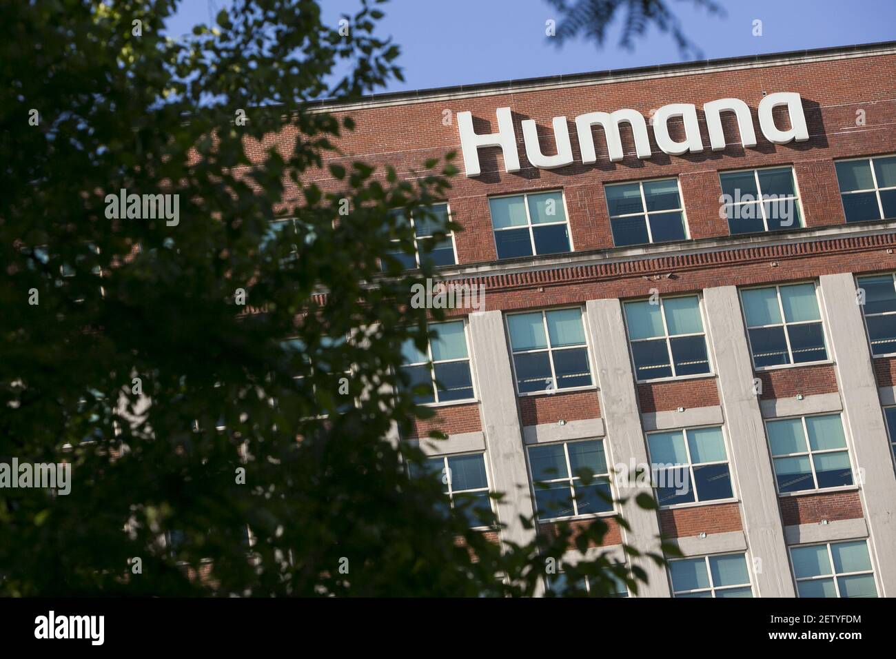 A logo sign outside of a facility occupied by Humana Inc., in ...