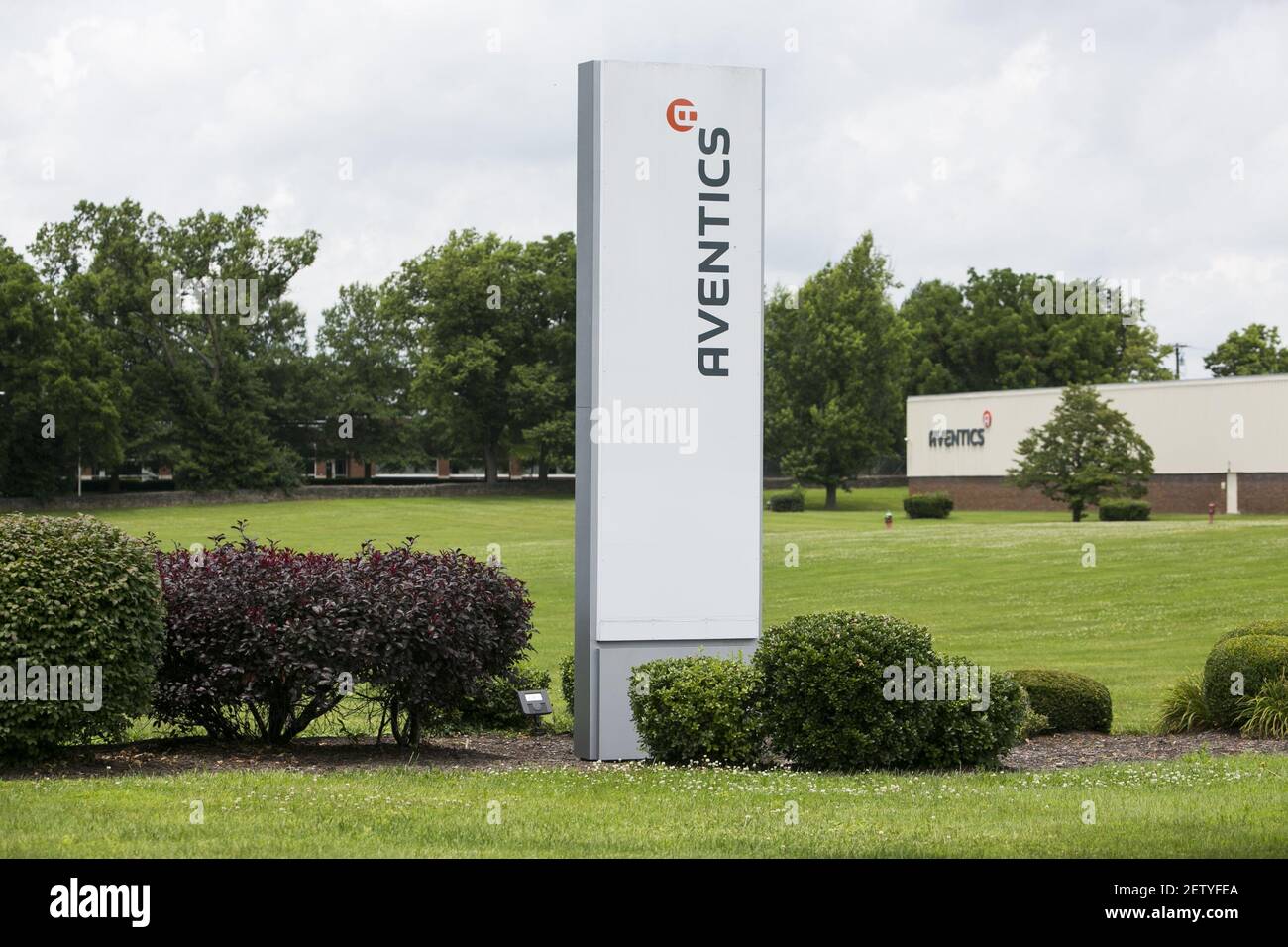 A logo sign outside of a facility occupied by Aventics in Lexington ...