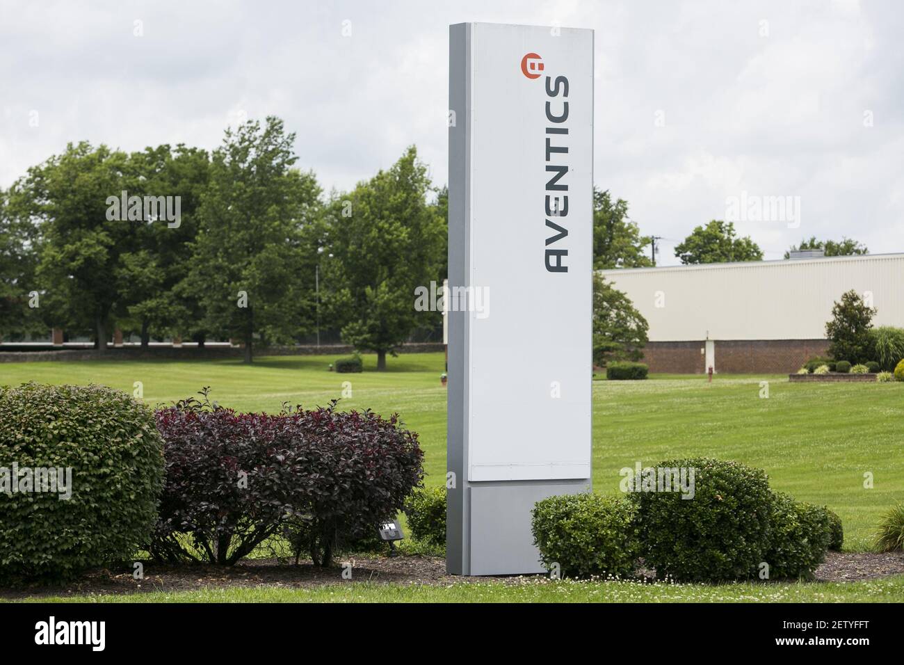 A logo sign outside of a facility occupied by Aventics in Lexington ...