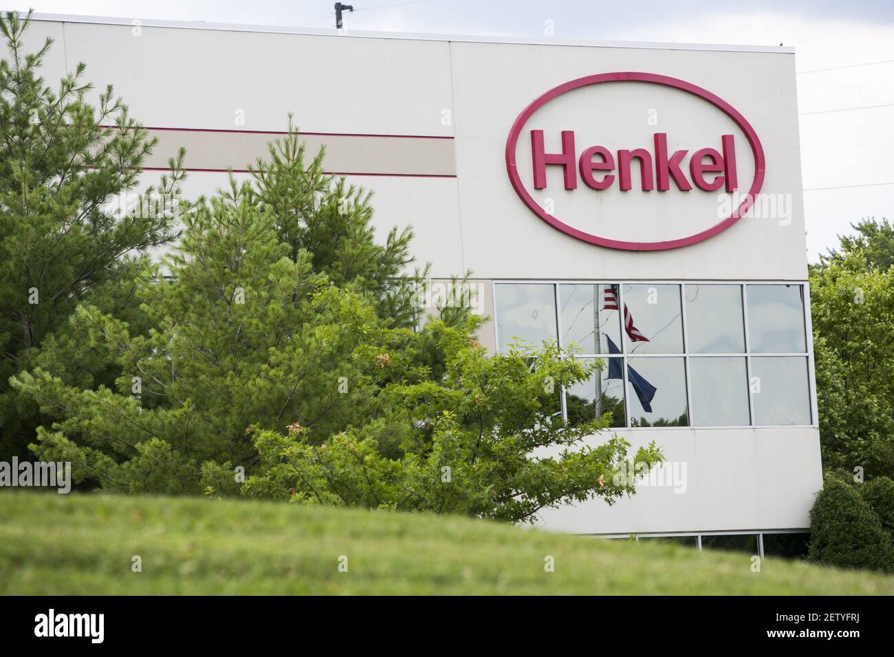 A logo sign outside of a facility occupied by Henkel AG & Company in ...