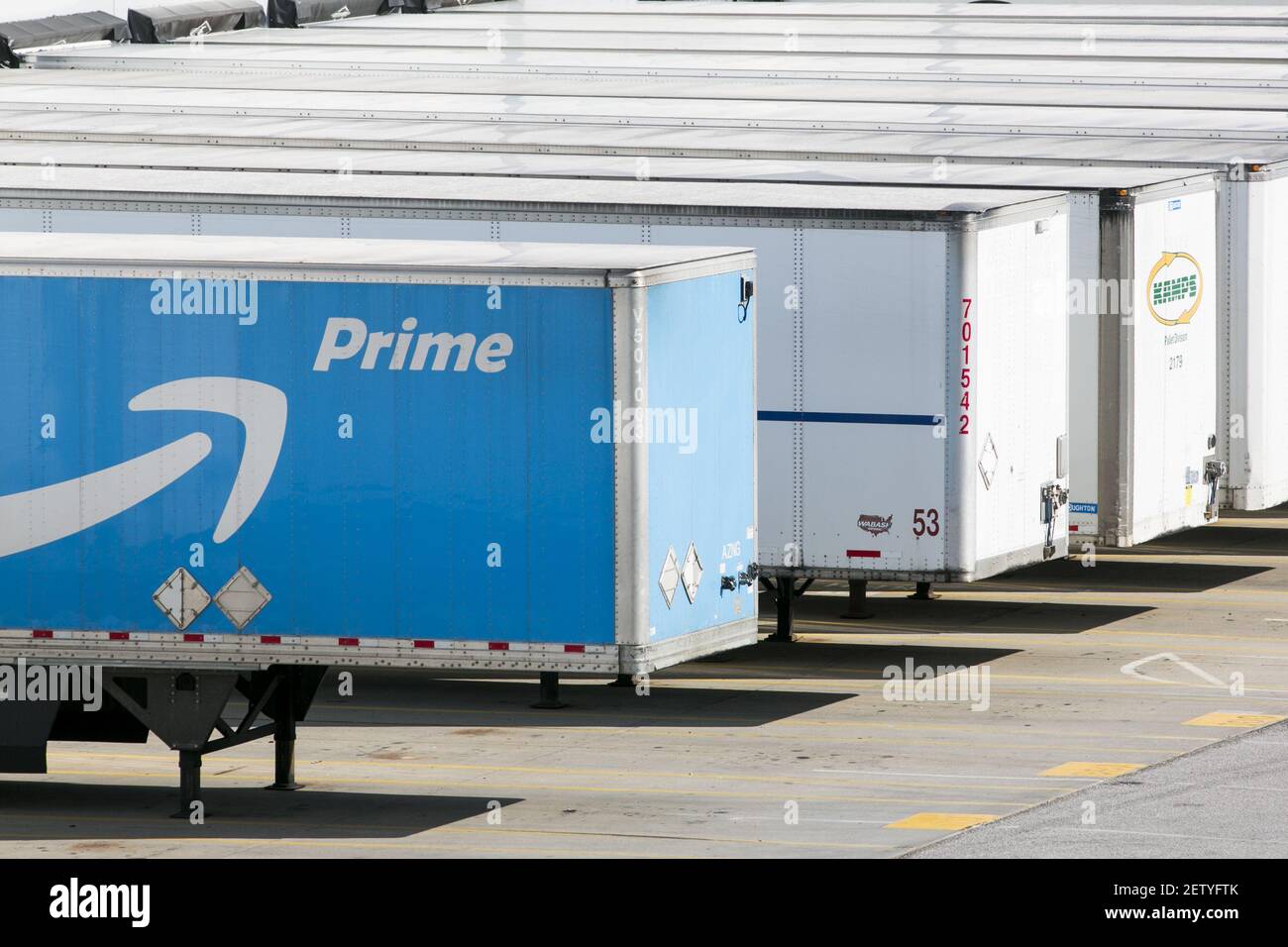 An Amazon Prime logo seen on semi truck trailers outside of a Amazon ...
