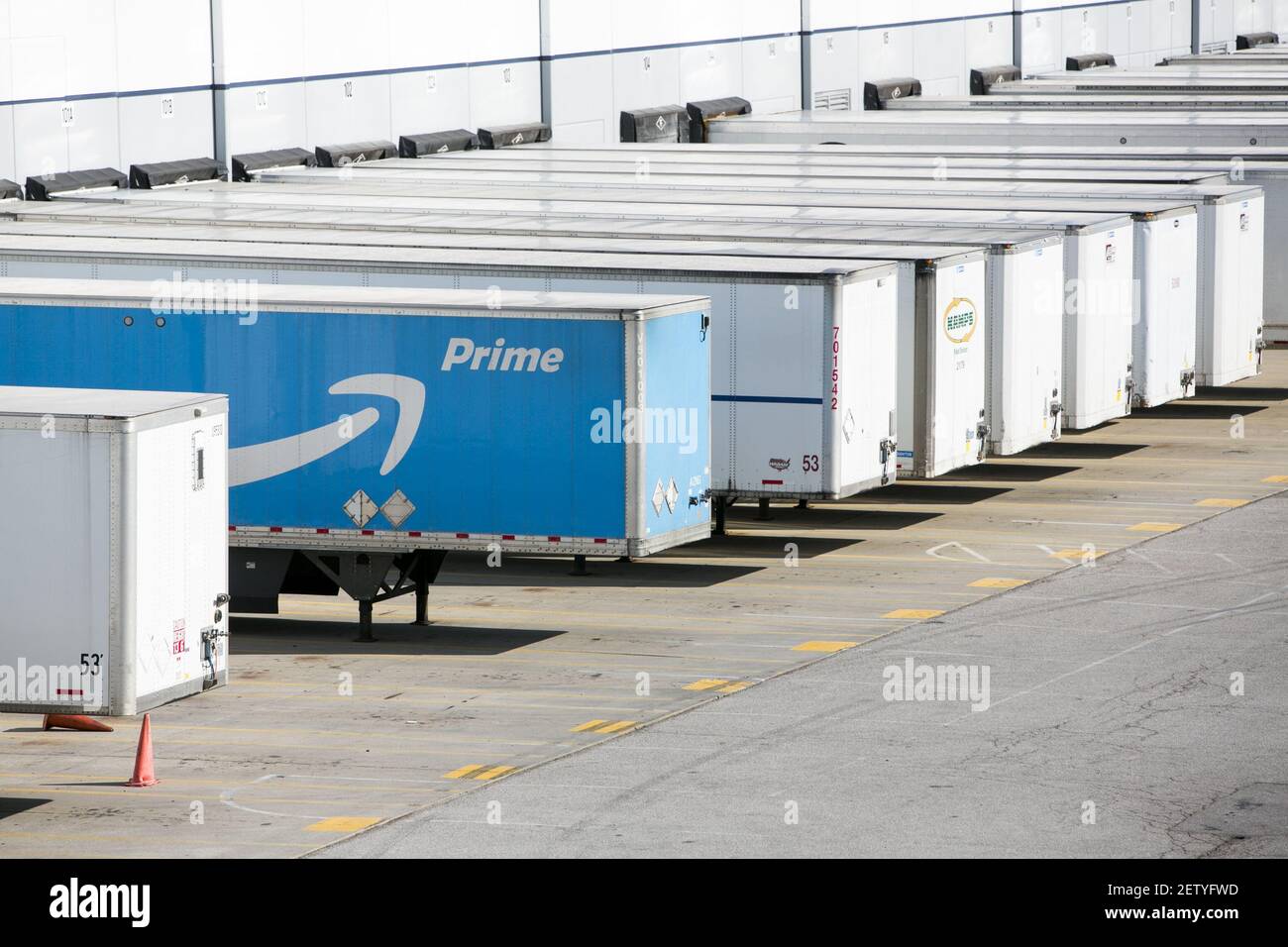 An Amazon Prime logo seen on semi truck trailers outside of a Amazon ...