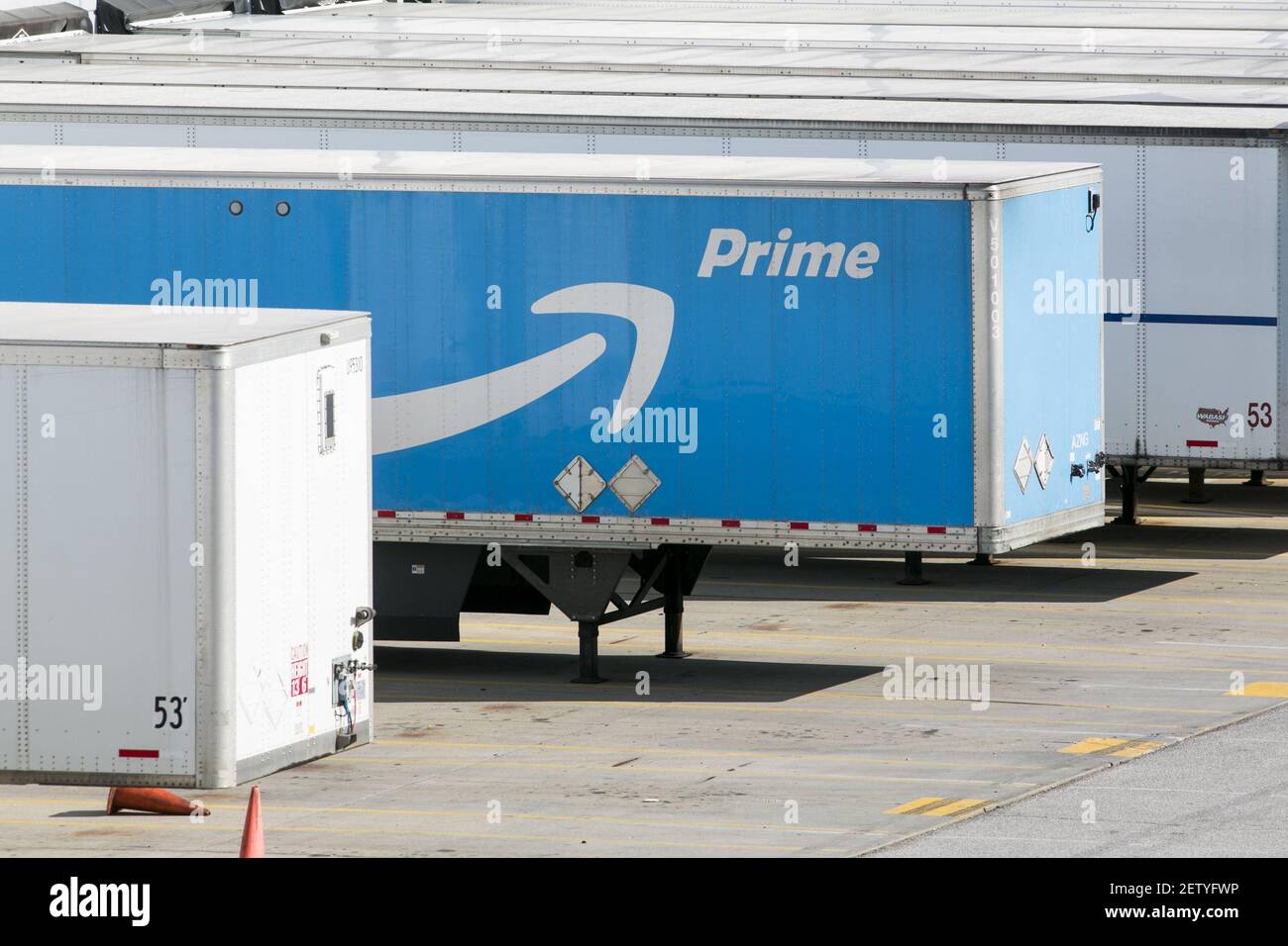 An Amazon Prime logo seen on semi truck trailers outside of a Amazon ...