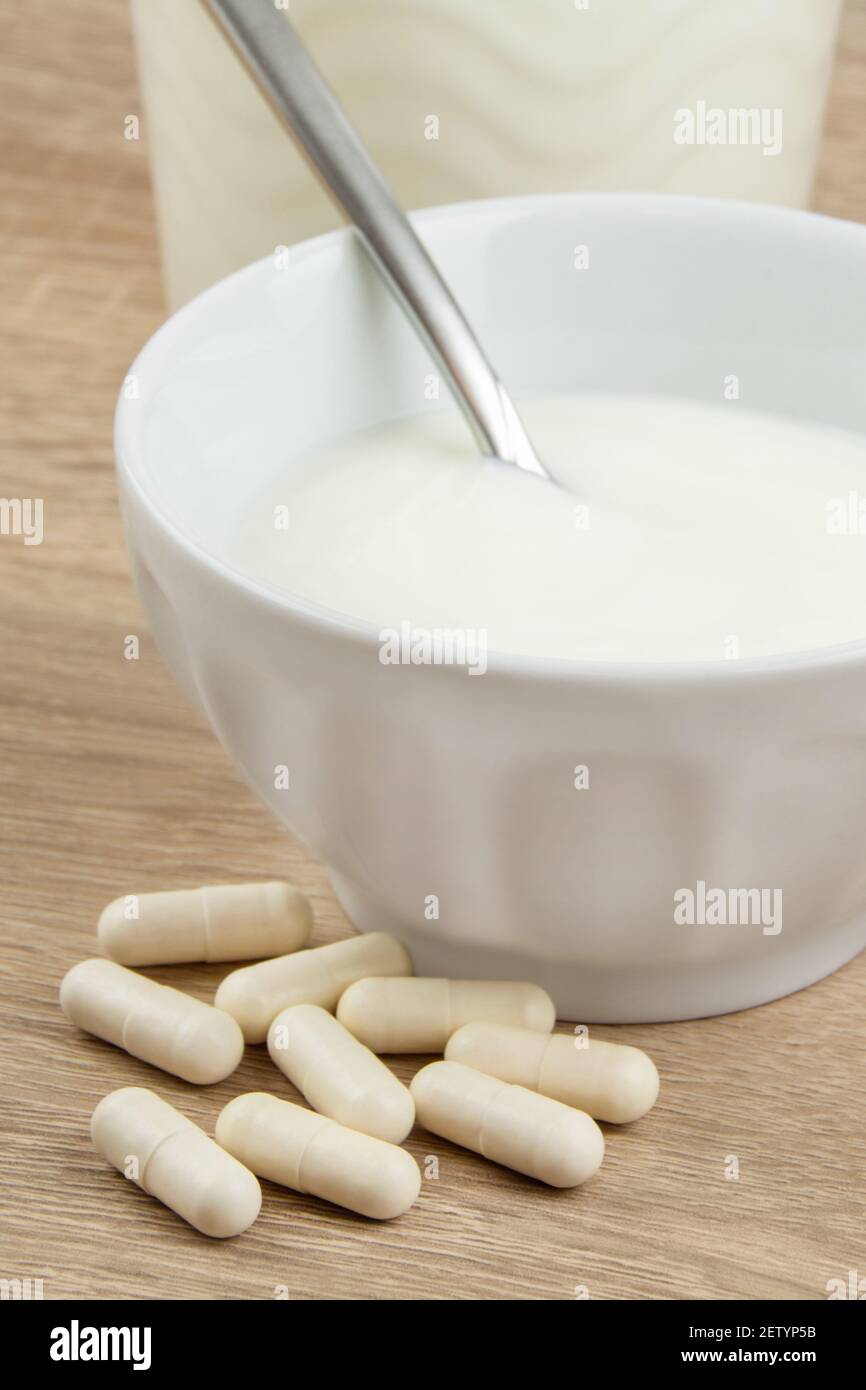 Probiotecs gut capsules with kefir and yogurt Stock Photo - Alamy