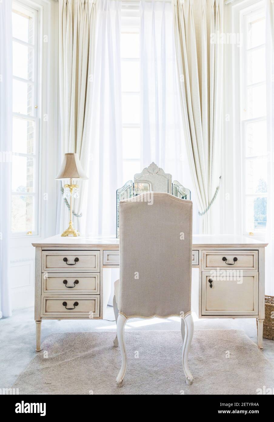 Elegant classic dressing table with mirror Stock Photo - Alamy