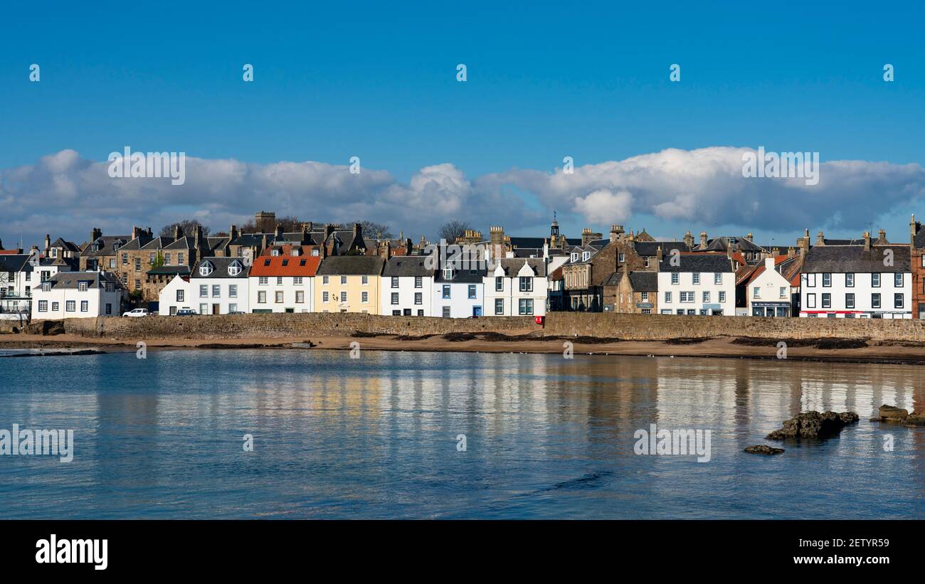 Row of historic old houses on waterfront of harbour at Anstruther in ...
