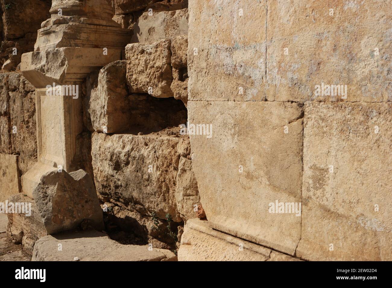 An ancient stone wall ruins close up Stock Photo - Alamy