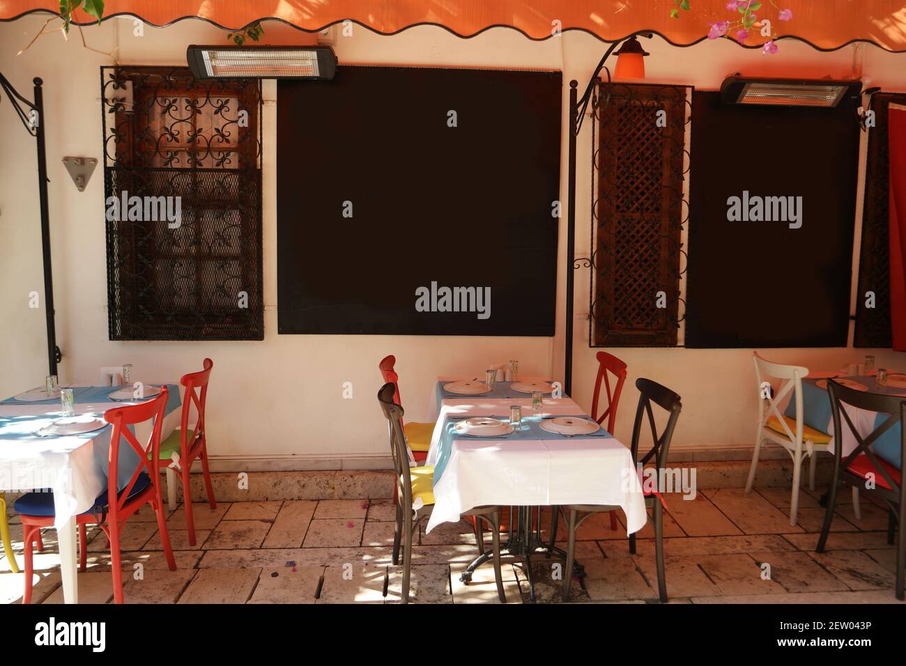 Outdoor dining area in cafe Stock Photo - Alamy