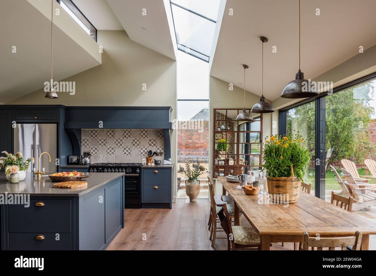 Double-height open plan kitchen by Tom Dunn in off-grid farmhouse ...