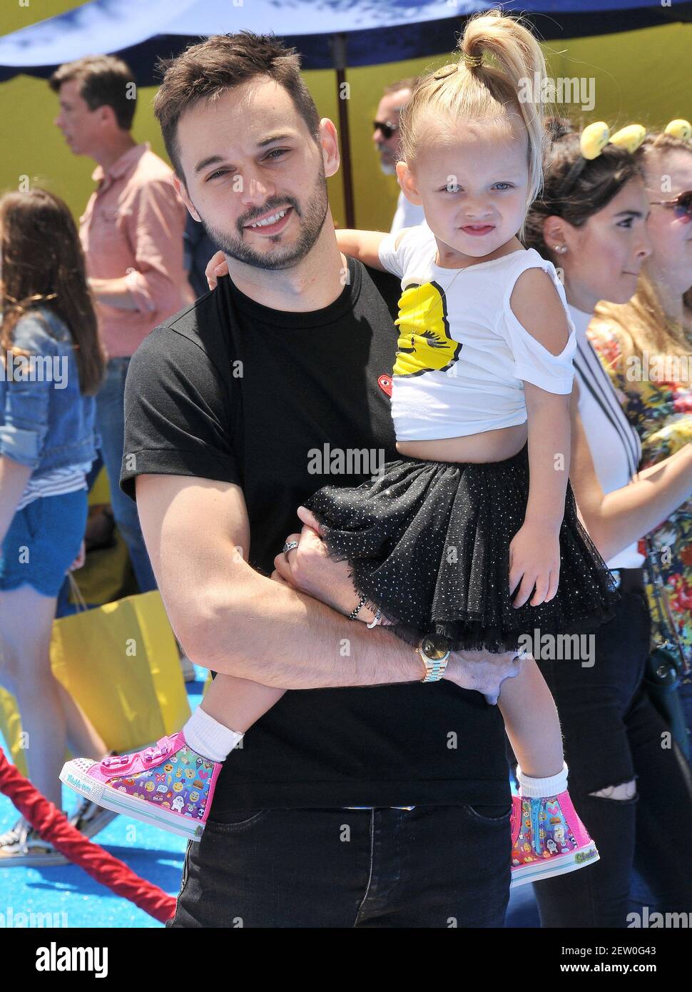 (L-R) Matthew Rutler and Summer Rain Rutler arrives at "The Emoji Movie ...