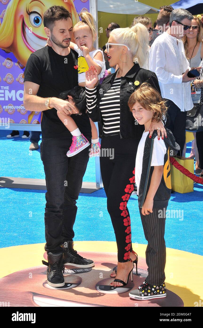 (L-R) Matthew Rutler, Daughter Summer Rain Rutler, Christina Aguilera ...