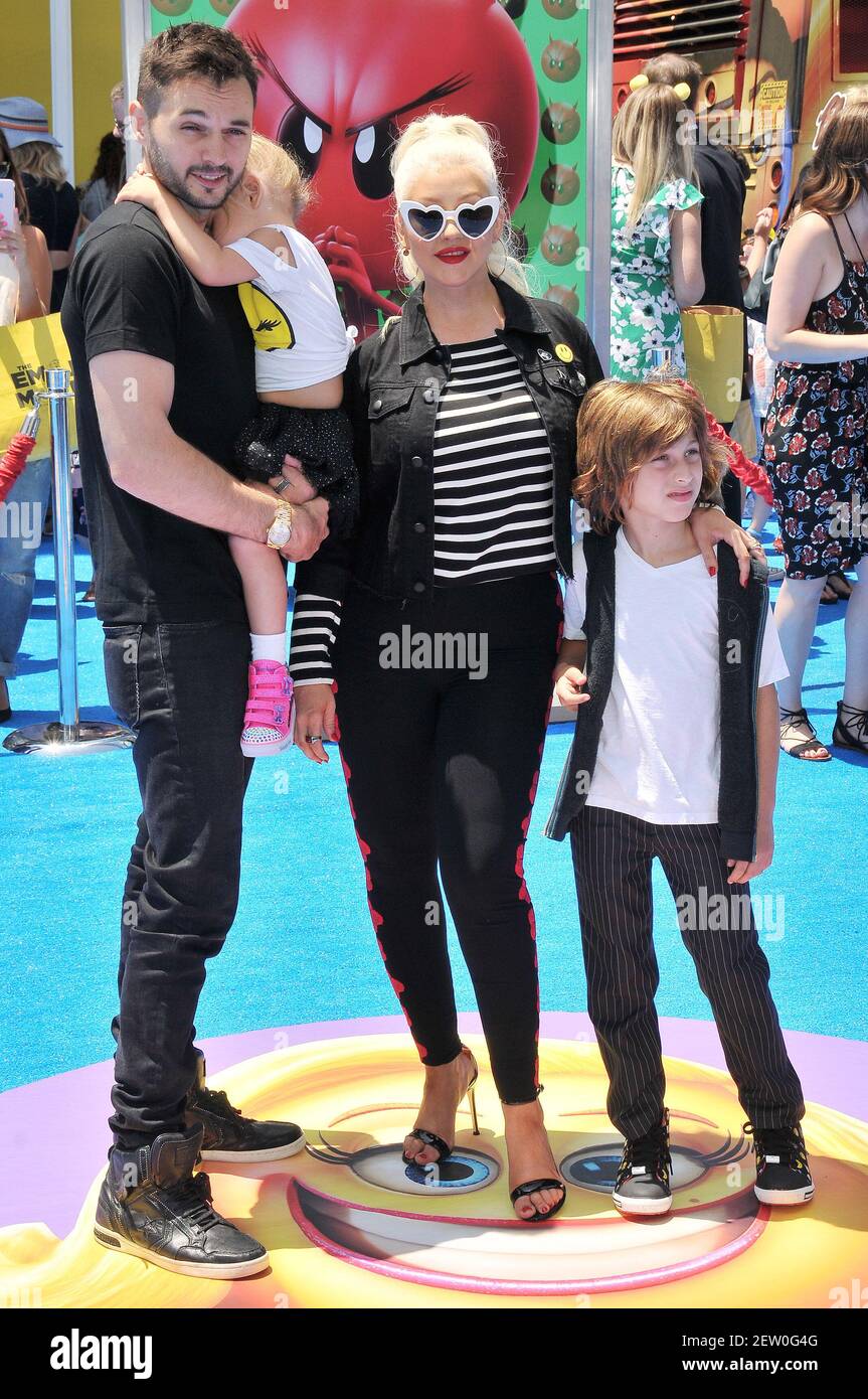 (L-R) Matthew Rutler, Daughter Summer Rain Rutler, Christina Aguilera ...