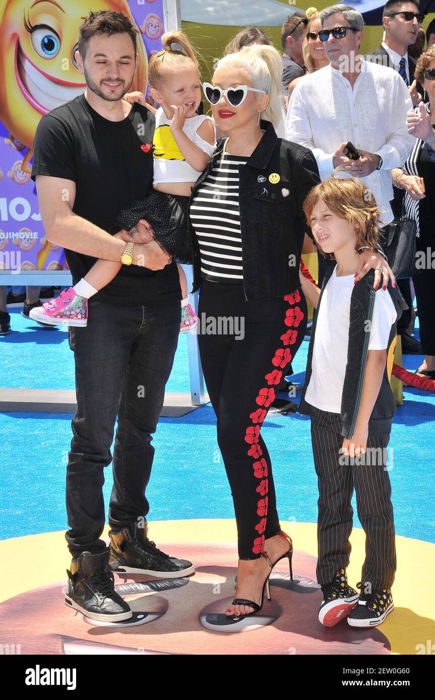 (L-R) Matthew Rutler, Daughter Summer Rain Rutler, Christina Aguilera ...