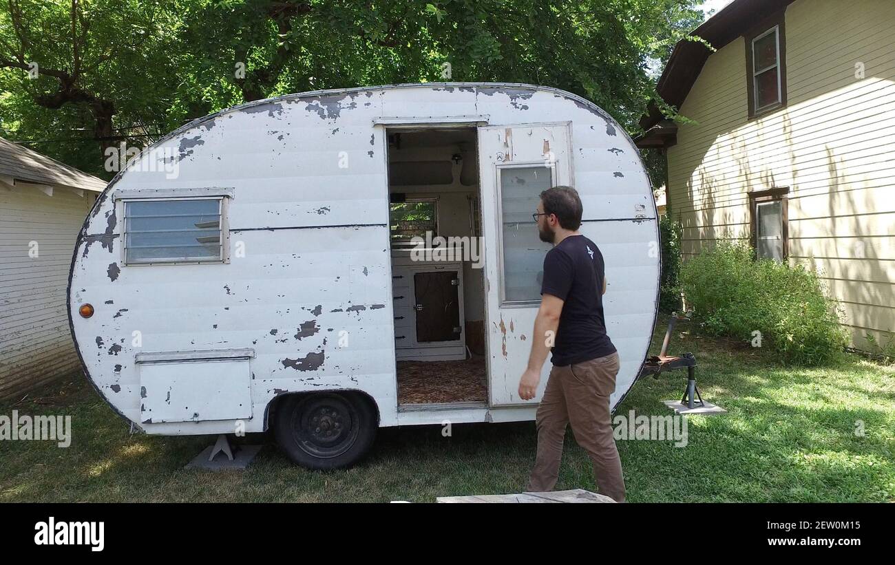 Conan Fugit stands in front of a trailer he and his wife, Katherine ...