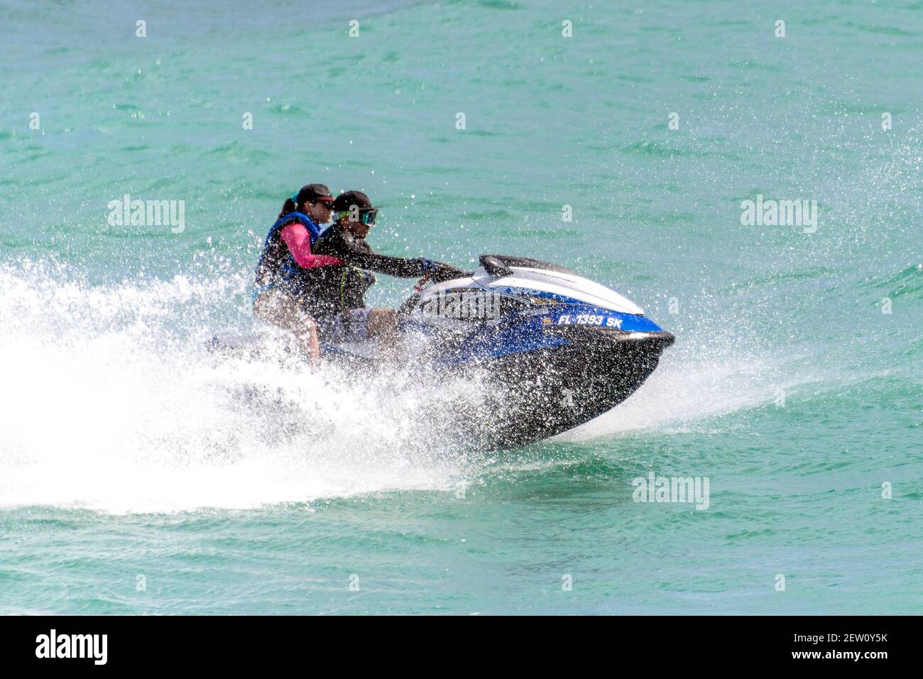 Couple enjoying a jet ski in Miami, Florida, USA Stock Photo - Alamy