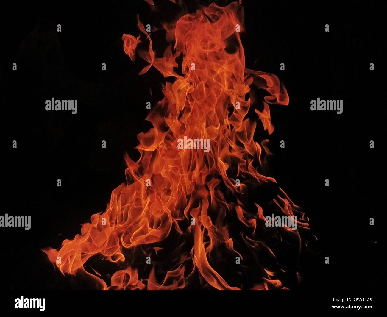 A beautiful shot of a large burning flame in the dark Stock Photo - Alamy