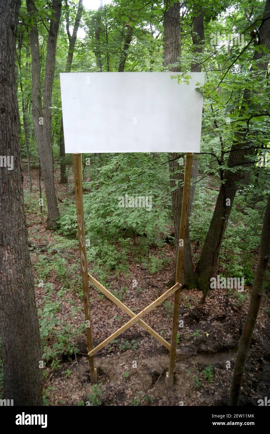 The elevated movie screen, visible from a screened-in porch, off the ...