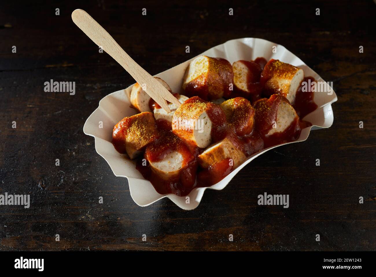 High angle of palatable fast food dish of fried pork sausage chunks ...