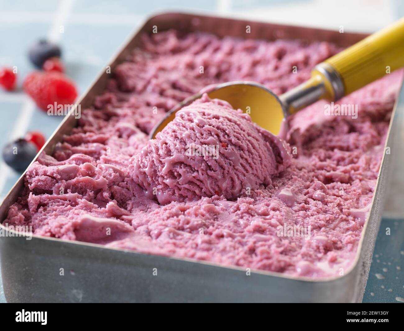 High angle of appetizing scoop of gelato with soft and creamy texture ...