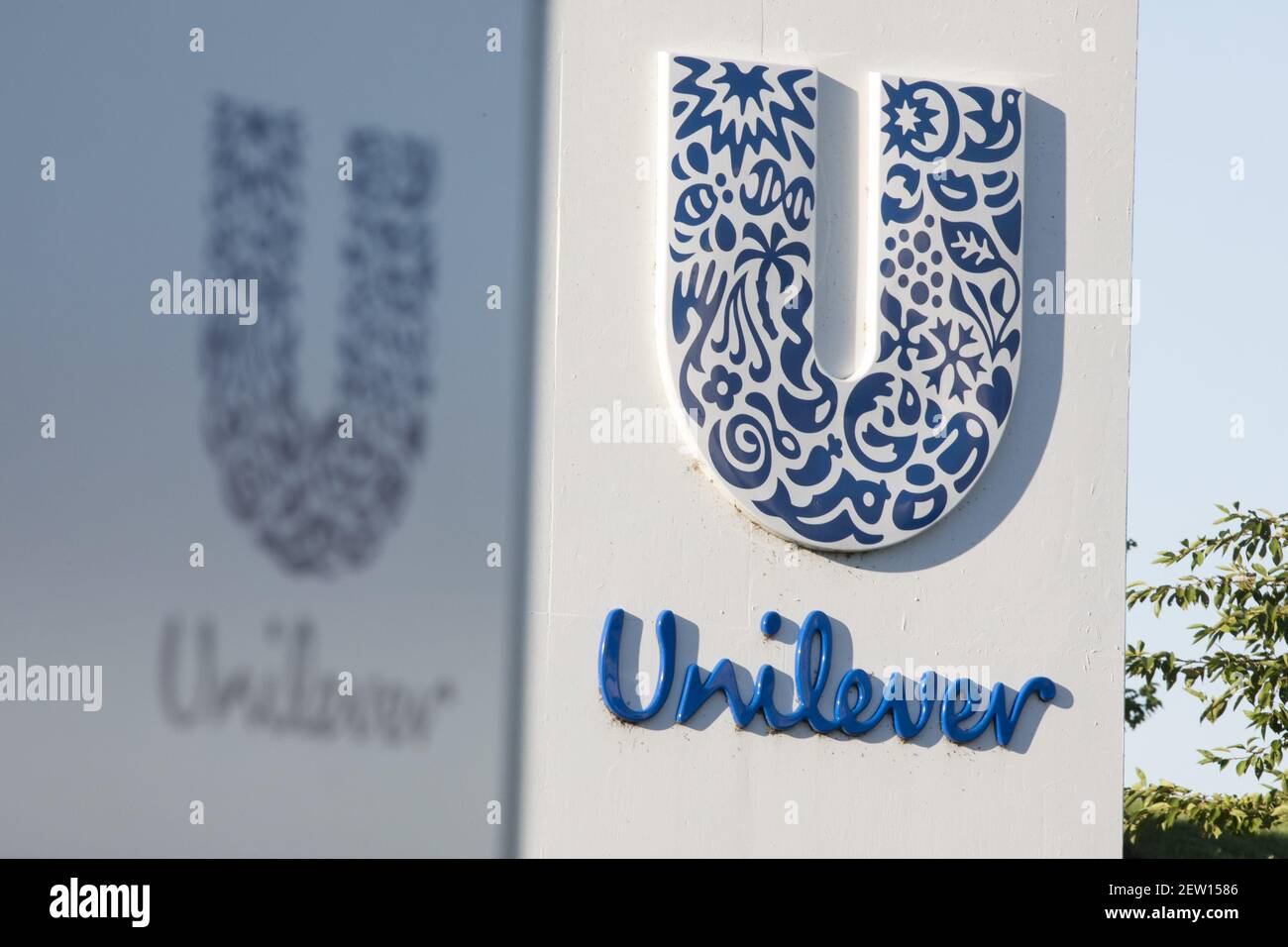 A logo sign outside of a facility occupied by Unilever in Newville ...