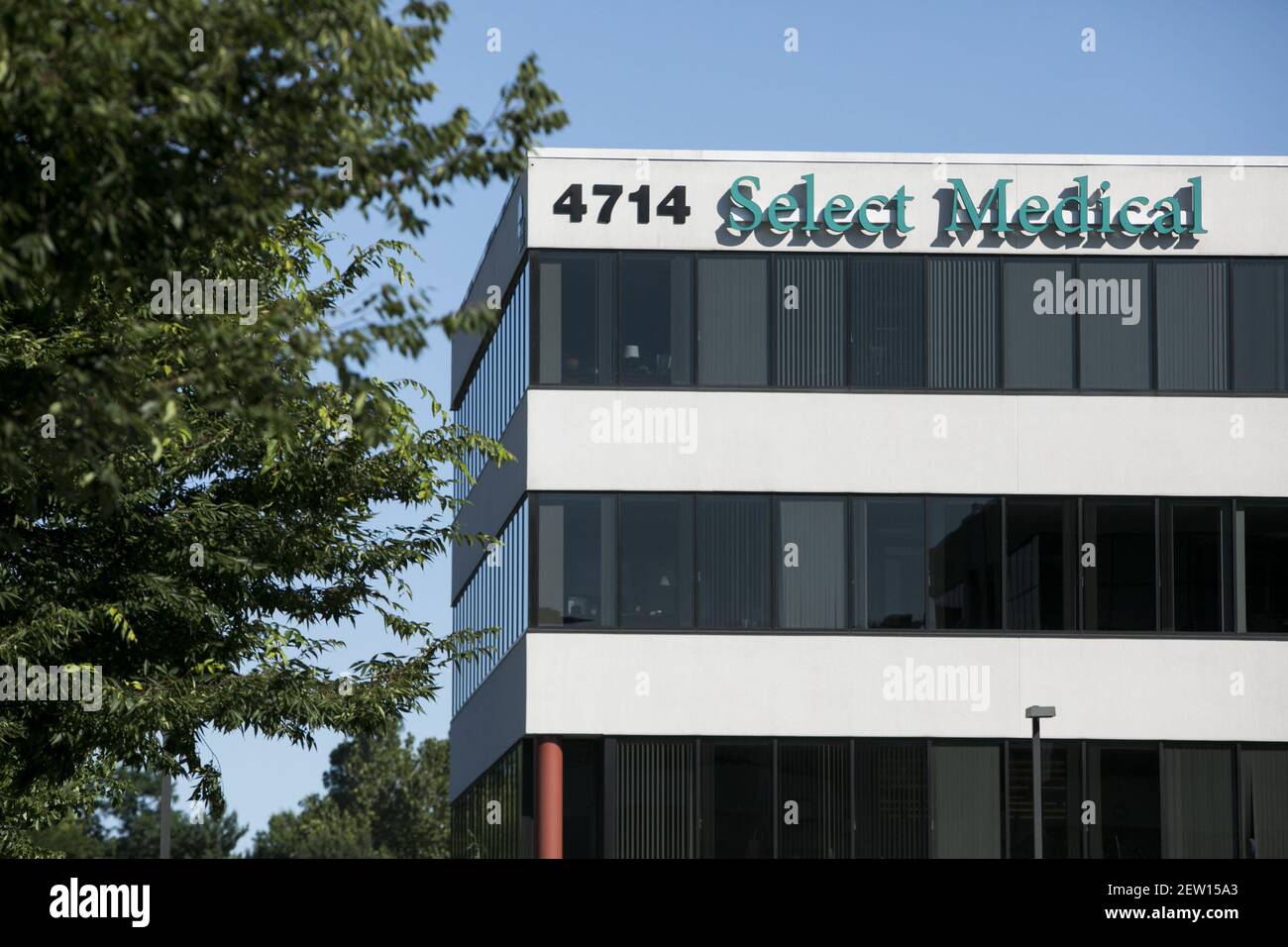 A logo sign outside of the headquarters of Select Medical in ...