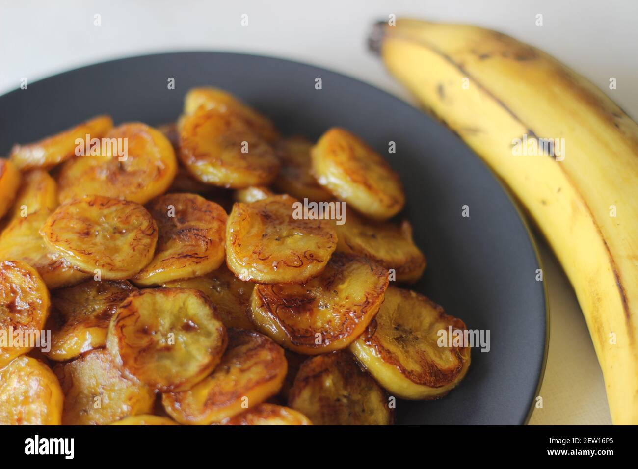 Caramelised plantain slices. A traditional tea time snack from Kerala ...