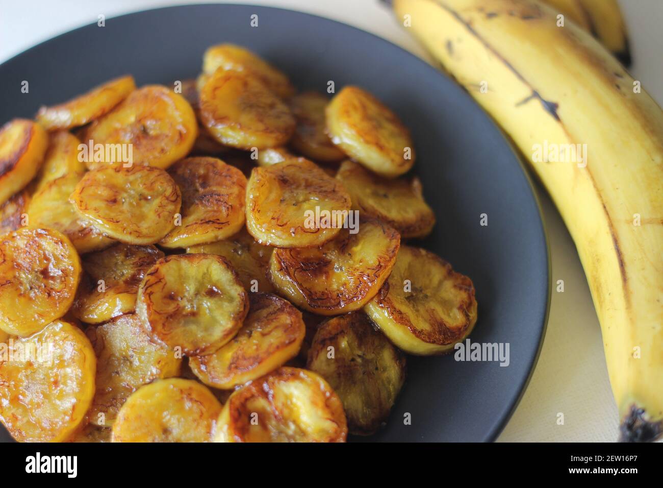 Caramelised plantain slices. A traditional tea time snack from Kerala ...