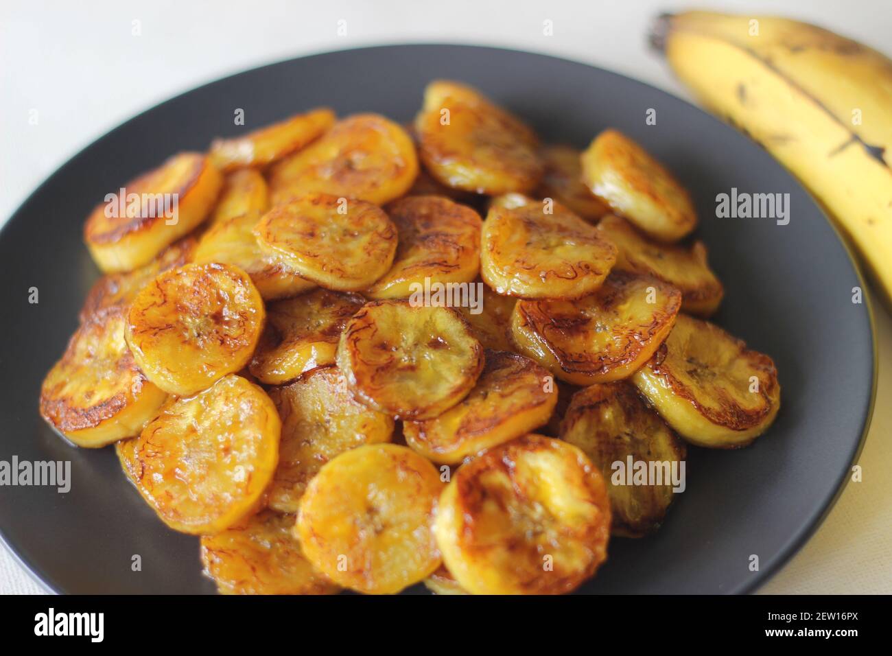 Caramelised plantain slices. A traditional tea time snack from Kerala ...