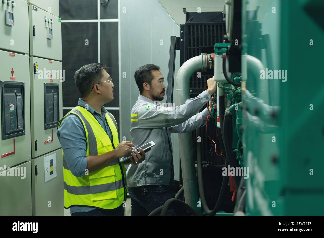 the technician preventive maintenance checking of generator of Industry ...
