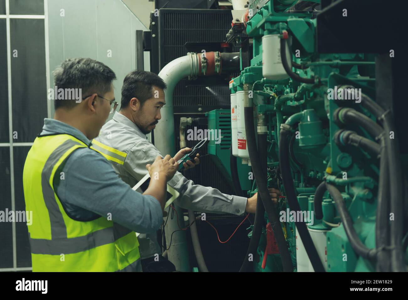 the technician preventive maintenance checking of generator of Industry ...