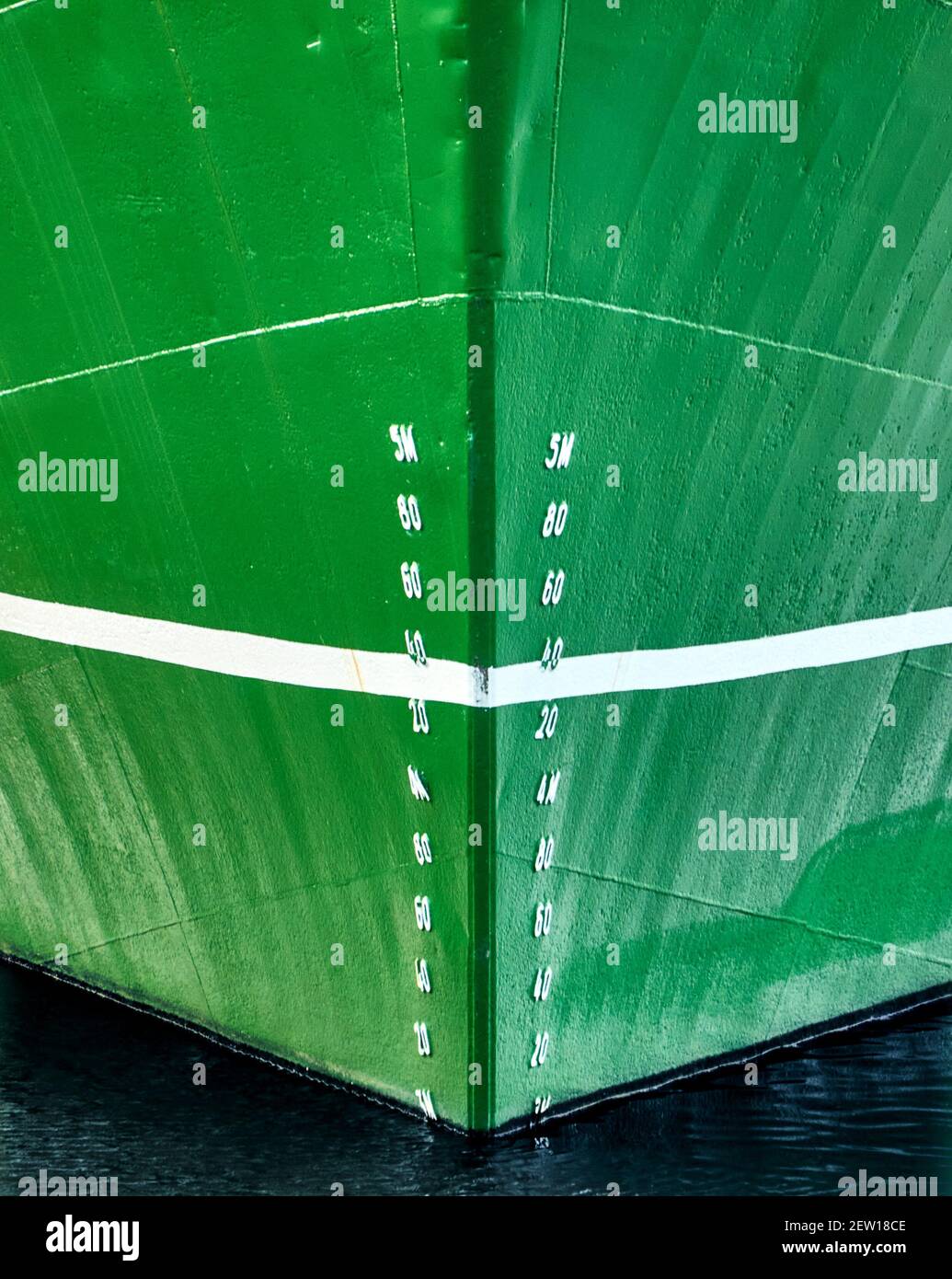 Abstract image of the depth line of a ship with green hull, white ...