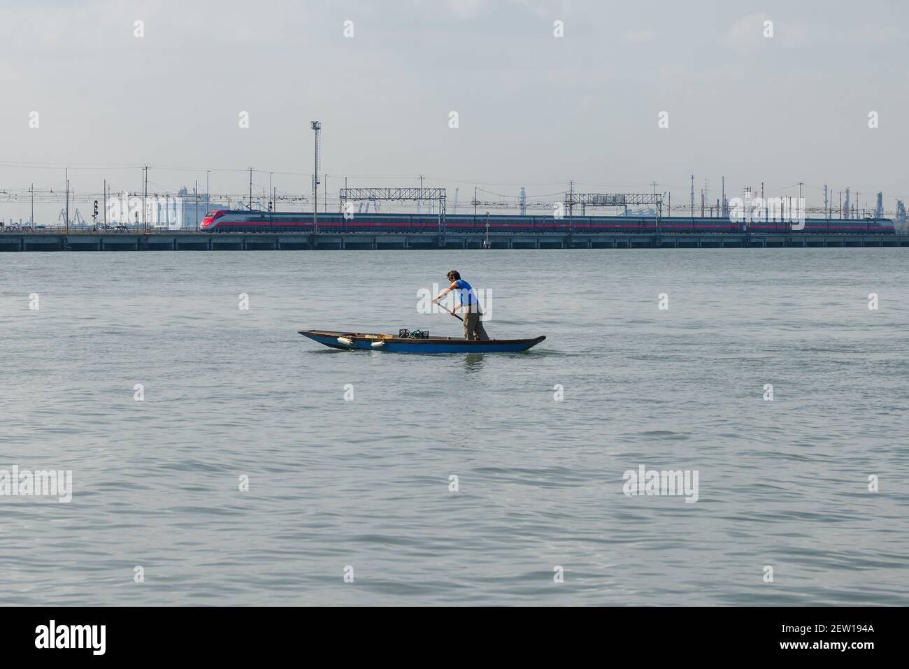 Old man rowing boat hi-res stock photography and images - Alamy