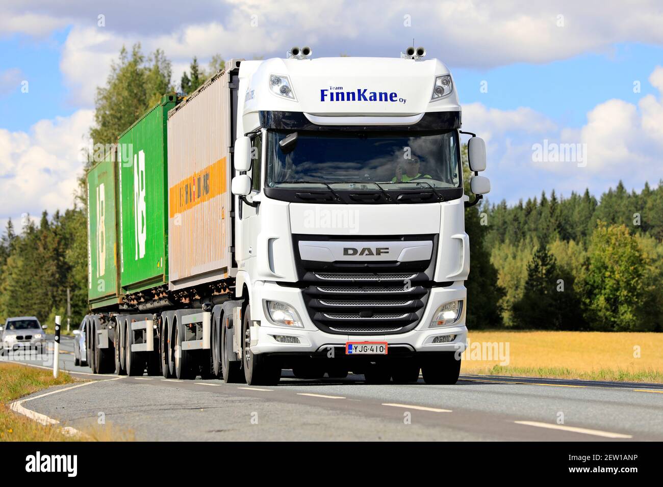 White DAF truck Finnkane Oy hauls long transport of three sea ...