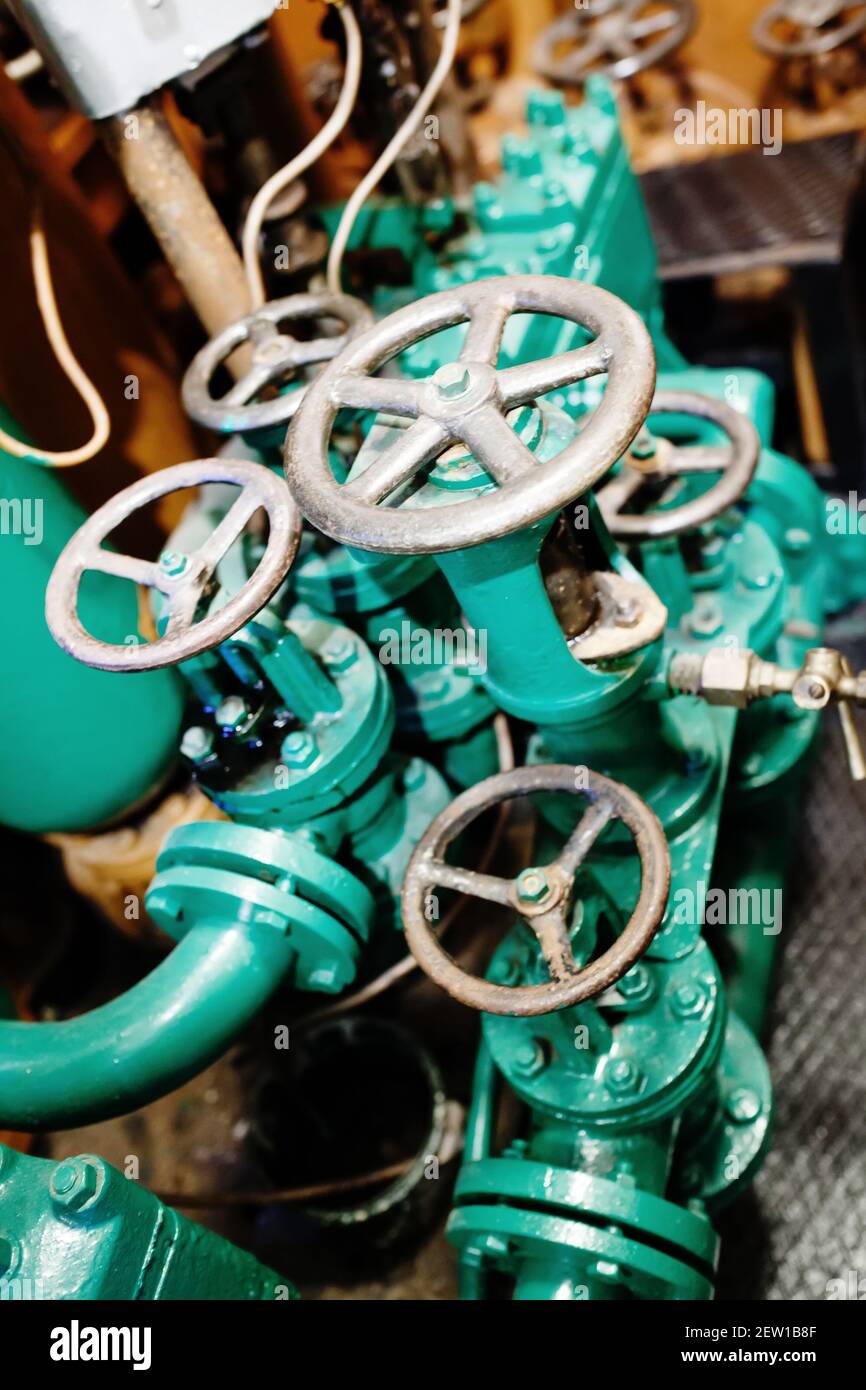 Old aged gray pipes and valves close-up Stock Photo - Alamy