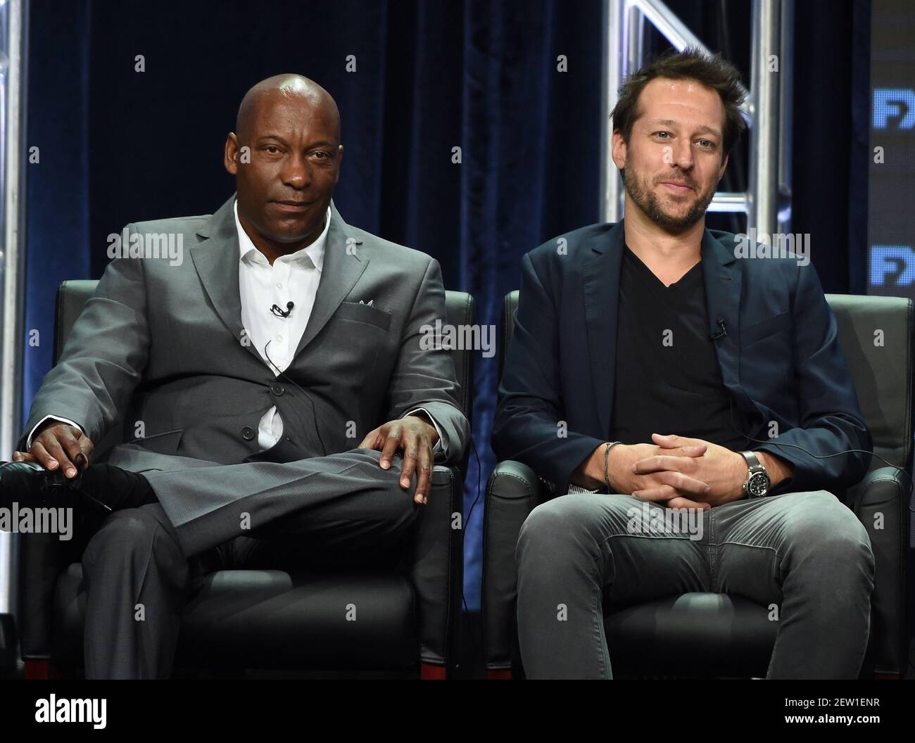 BEVERLY HILLS - AUGUST 9: John Singleton and Dave Andron onstage during ...