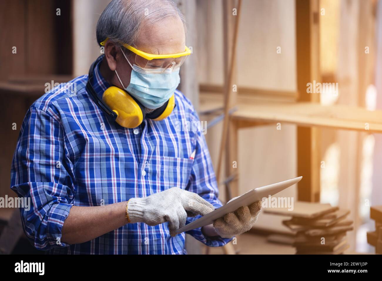 Craftsman holding digital touch hi-res stock photography and images - Alamy