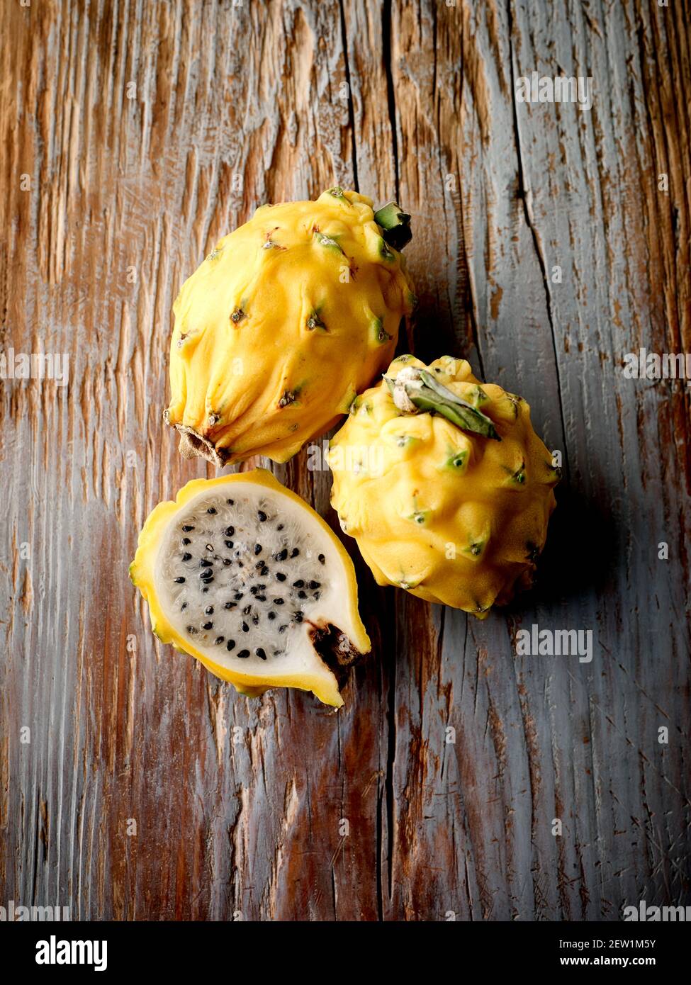Fruits of the Dragon or yellow Pitaya with white flesh (Selenicereus ...